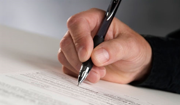 mano-firmando - NODAL